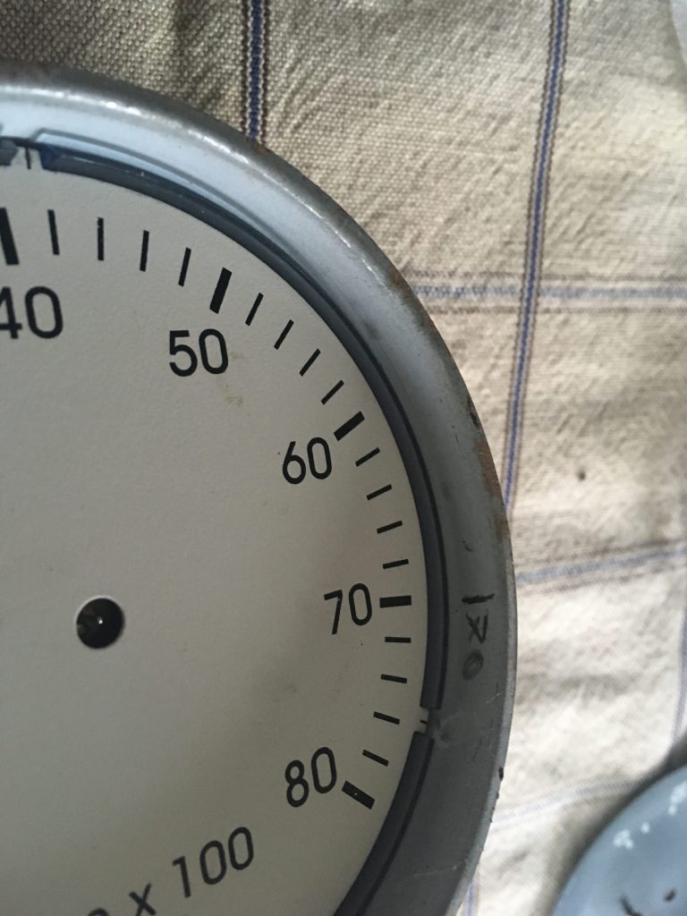 Replacing the dial face of a modern tachometer with the original ...
